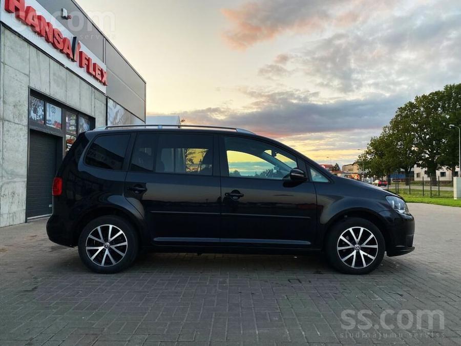 Melns Volkswagen Touran 2011 Cēsis, ar dzinēja tilpumu 1.60 L un nobraukumu 283 tūkst. km par 6600 €, foto 13 vietnē AUTOMOTO.COM.LV