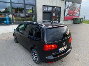 Black Volkswagen Touran 2011 in Cesis, with an engine capacity of 1.60 L and mileage of 283 thousand km for 6600 €, photo 8 on AUTOMOTO.COM.LV