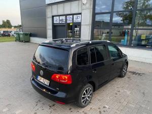 Black Volkswagen Touran 2011 in Cesis, with an engine capacity of 1.60 L and mileage of 283 thousand km for 6600 €, photo 10 on AUTOMOTO.COM.LV