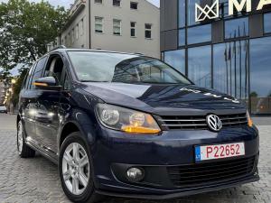 Black Volkswagen Touran 2011 in Kaunas, with an engine capacity of 2.00 L and mileage of 298 thousand km for 6200 €, photo 3 on AUTOMOTO.COM.LV