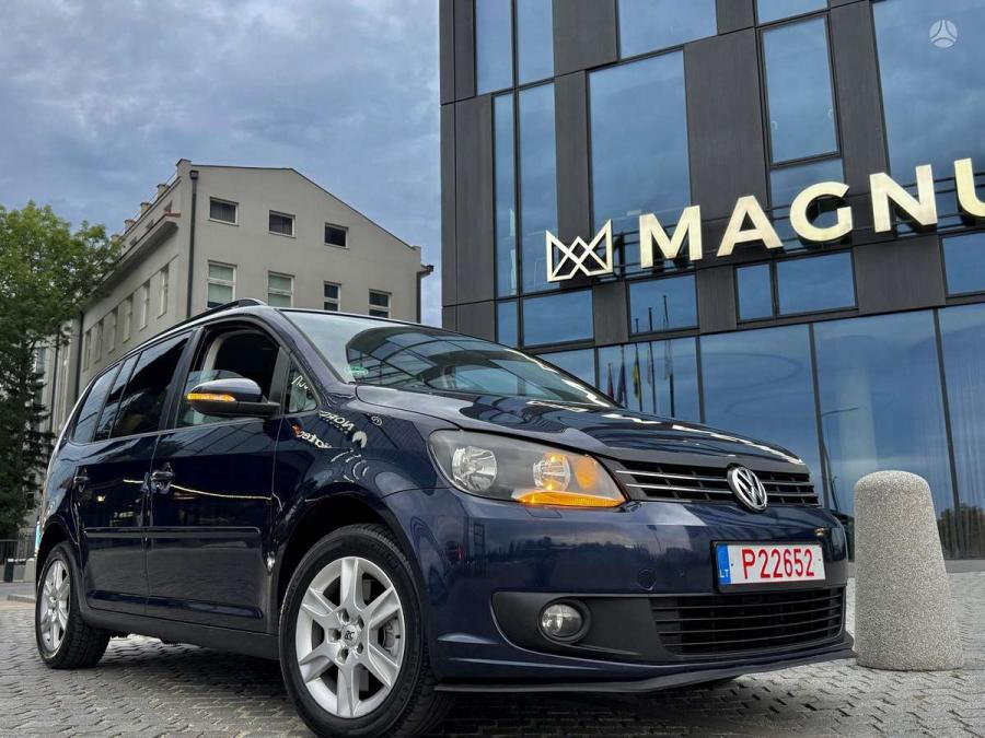 Black Volkswagen Touran 2011 in Kaunas, with an engine capacity of 2.00 L and mileage of 298 thousand km for 6200 €, photo 4 on AUTOMOTO.COM.LV