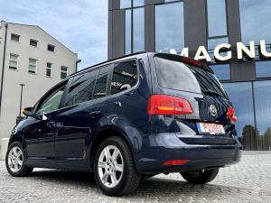 Black Volkswagen Touran 2011 in Kaunas, with an engine capacity of 2.00 L and mileage of 298 thousand km for 6200 €, photo 9 on AUTOMOTO.COM.LV