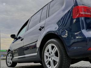 Black Volkswagen Touran 2011 in Kaunas, with an engine capacity of 2.00 L and mileage of 298 thousand km for 6200 €, photo 12 on AUTOMOTO.COM.LV
