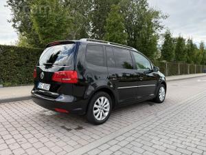 Black Volkswagen Touran 2011 in Ventspils, with an engine capacity of 2.00 L and mileage of 369 thousand km for 6499 €, photo 8 on AUTOMOTO.COM.LV