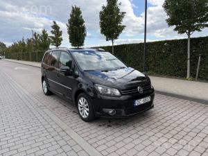 Black Volkswagen Touran 2011 in Ventspils, with an engine capacity of 2.00 L and mileage of 369 thousand km for 6499 €, photo 26 on AUTOMOTO.COM.LV