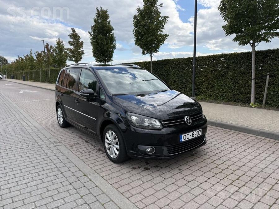 Black Volkswagen Touran 2011 in Ventspils, with an engine capacity of 2.00 L and mileage of 369 thousand km for 6499 €, photo 26 on AUTOMOTO.COM.LV