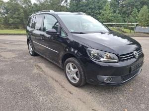 Black Volkswagen Touran 2011 in Utena, with an engine capacity of 1.97 L and mileage of 250 thousand km for 5300 €, photo 1 on AUTOMOTO.COM.LV