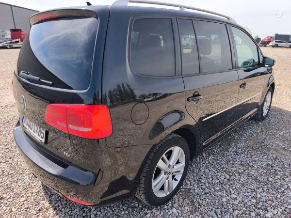 Black Volkswagen Touran 2011 in Marijampole, with an engine capacity of 1.60 L and mileage of 224 thousand km for 4390 €, photo 5 on AUTOMOTO.COM.LV