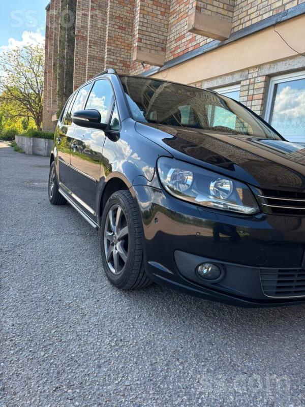 Melns Volkswagen Touran 2011 Saldus, ar dzinēja tilpumu 1.40 L un nobraukumu 280 tūkst. km par 3000 €, foto 1 vietnē AUTOMOTO.COM.LV