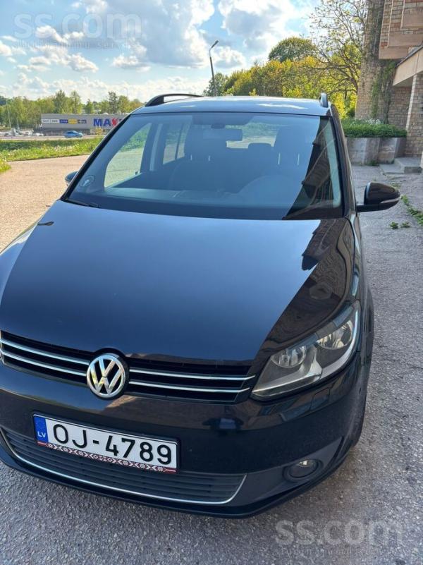 Melns Volkswagen Touran 2011 Saldus, ar dzinēja tilpumu 1.40 L un nobraukumu 280 tūkst. km par 3000 €, foto 5 vietnē AUTOMOTO.COM.LV