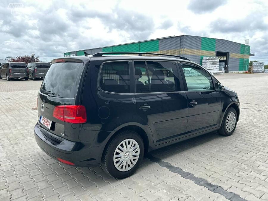 Black Volkswagen Touran 2011 in Klaipeda, with an engine capacity of 1.60 L and mileage of 289 thousand km for 5000 €, photo 4 on AUTOMOTO.COM.LV