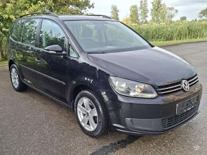Black Volkswagen Touran 2011 in Ukmerge, with an engine capacity of 1.60 L and mileage of 291 thousand km for 4350 €, photo 3 on AUTOMOTO.COM.LV