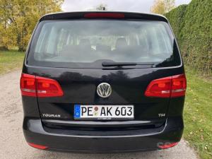 Black Volkswagen Touran 2011 in Bauska, with an engine capacity of 1.60 L and mileage of 0 thousand km for 4900 €, photo 5 on AUTOMOTO.COM.LV