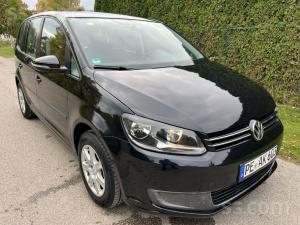 Black Volkswagen Touran 2011 in Bauska, with an engine capacity of 1.60 L and mileage of 0 thousand km for 4900 €, photo 11 on AUTOMOTO.COM.LV