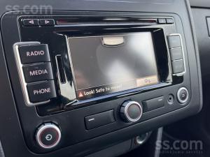 Black Volkswagen Touran 2011 in Bauska, with an engine capacity of 1.60 L and mileage of 0 thousand km for 4900 €, photo 26 on AUTOMOTO.COM.LV