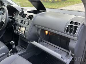 Black Volkswagen Touran 2011 in Bauska, with an engine capacity of 1.60 L and mileage of 0 thousand km for 4900 €, photo 27 on AUTOMOTO.COM.LV