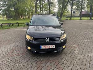 Black Volkswagen Touran 2011 in Kursenai, with an engine capacity of 1.60 L and mileage of 0 thousand km for 4799 €, photo 3 on AUTOMOTO.COM.LV