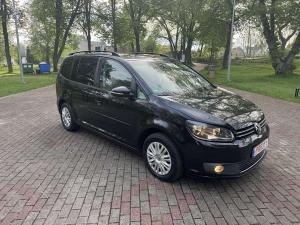 Black Volkswagen Touran 2011 in Kursenai, with an engine capacity of 1.60 L and mileage of 0 thousand km for 4799 €, photo 4 on AUTOMOTO.COM.LV