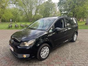 Black Volkswagen Touran 2011 in Kursenai, with an engine capacity of 1.60 L and mileage of 0 thousand km for 4799 €, photo 5 on AUTOMOTO.COM.LV
