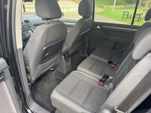 Black Volkswagen Touran 2011 in Kursenai, with an engine capacity of 1.60 L and mileage of 0 thousand km for 4799 €, photo 11 on AUTOMOTO.COM.LV