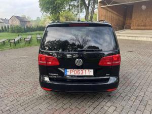 Black Volkswagen Touran 2011 in Kursenai, with an engine capacity of 1.60 L and mileage of 0 thousand km for 4799 €, photo 12 on AUTOMOTO.COM.LV