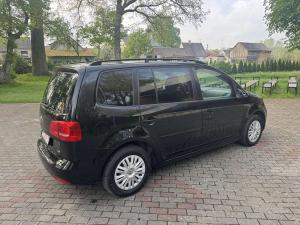 Black Volkswagen Touran 2011 in Kursenai, with an engine capacity of 1.60 L and mileage of 0 thousand km for 4799 €, photo 14 on AUTOMOTO.COM.LV