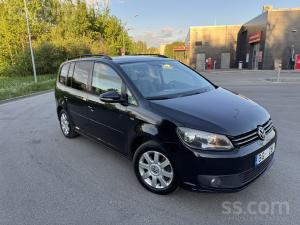 Black Volkswagen Touran 2012 in Riga, with an engine capacity of 2.00 L and mileage of 0 thousand km for 5100 €, photo 2 on AUTOMOTO.COM.LV