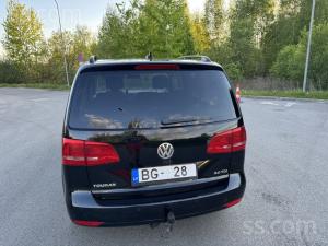 Black Volkswagen Touran 2012 in Riga, with an engine capacity of 2.00 L and mileage of 0 thousand km for 5100 €, photo 5 on AUTOMOTO.COM.LV
