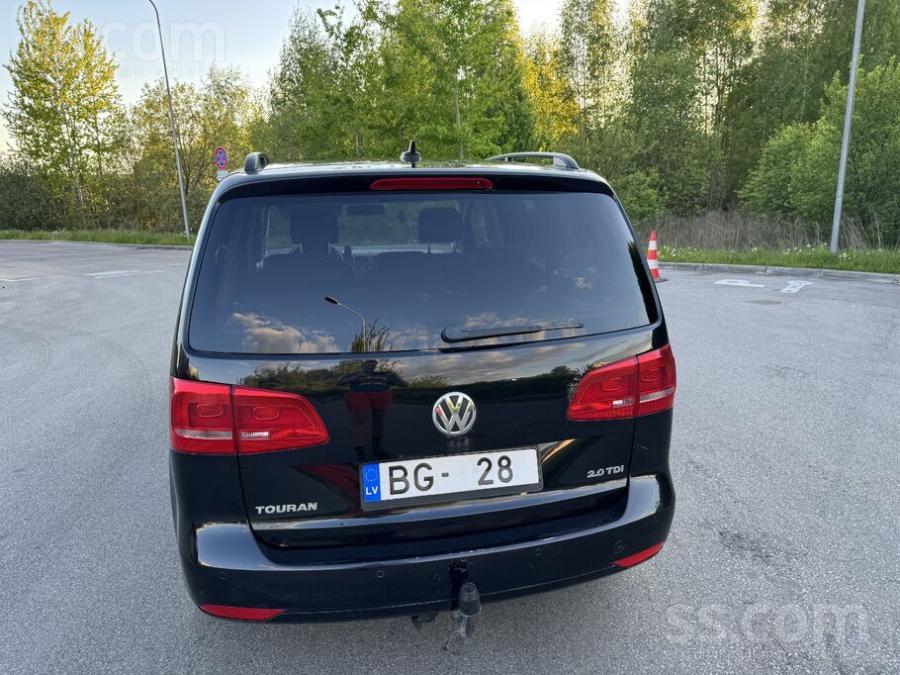 Black Volkswagen Touran 2012 in Riga, with an engine capacity of 2.00 L and mileage of 0 thousand km for 5100 €, photo 5 on AUTOMOTO.COM.LV