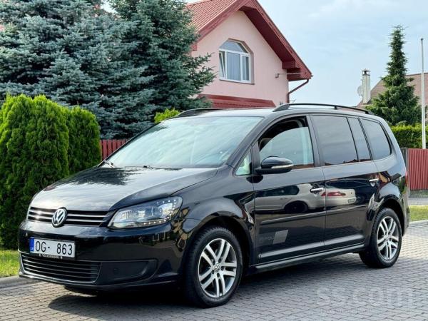 Melns Volkswagen Touran 2012 Rīga, ar dzinēja tilpumu 1.40 L un nobraukumu 244 tūkst. km par 6500 €, foto 2 vietnē AUTOMOTO.COM.LV