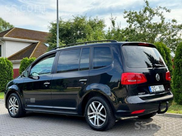 Melns Volkswagen Touran 2012 Rīga, ar dzinēja tilpumu 1.40 L un nobraukumu 244 tūkst. km par 6500 €, foto 4 vietnē AUTOMOTO.COM.LV