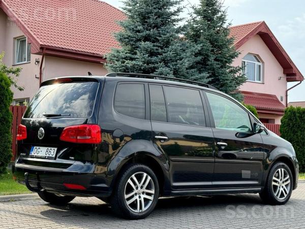 Melns Volkswagen Touran 2012 Rīga, ar dzinēja tilpumu 1.40 L un nobraukumu 244 tūkst. km par 6500 €, foto 8 vietnē AUTOMOTO.COM.LV