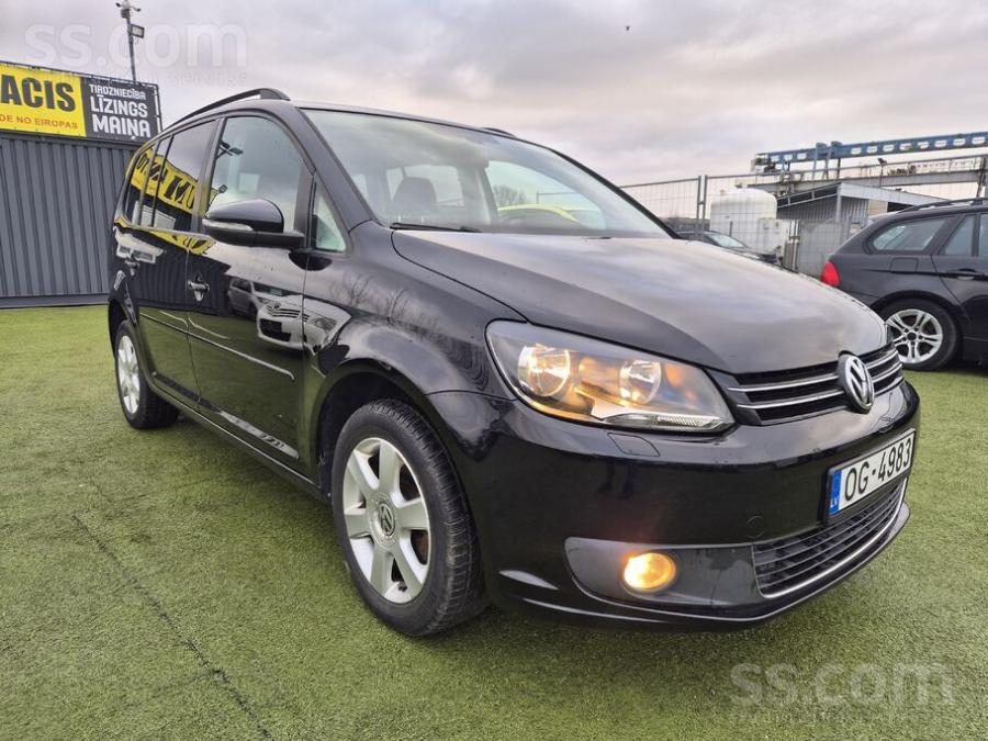 Melns Volkswagen Touran 2012 Liepāja, ar dzinēja tilpumu 1.60 L un nobraukumu 162 tūkst. km par 6200 €, foto 3 vietnē AUTOMOTO.COM.LV