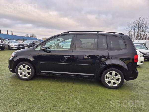 Melns Volkswagen Touran 2012 Liepāja, ar dzinēja tilpumu 1.60 L un nobraukumu 162 tūkst. km par 6200 €, foto 8 vietnē AUTOMOTO.COM.LV