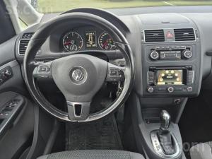 Melns Volkswagen Touran 2012 Liepāja, ar dzinēja tilpumu 1.60 L un nobraukumu 162 tūkst. km par 6200 €, foto 17 vietnē AUTOMOTO.COM.LV