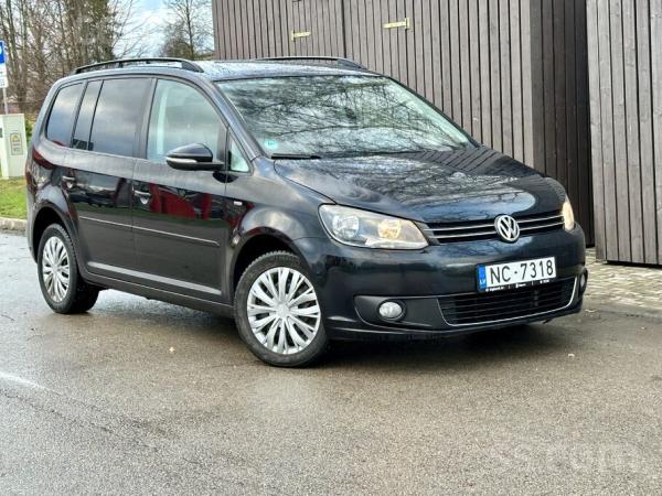Black Volkswagen Touran 2012 in Jelgava, with an engine capacity of 2.00 L and mileage of 305 thousand km for 5700 €, photo 3 on AUTOMOTO.COM.LV