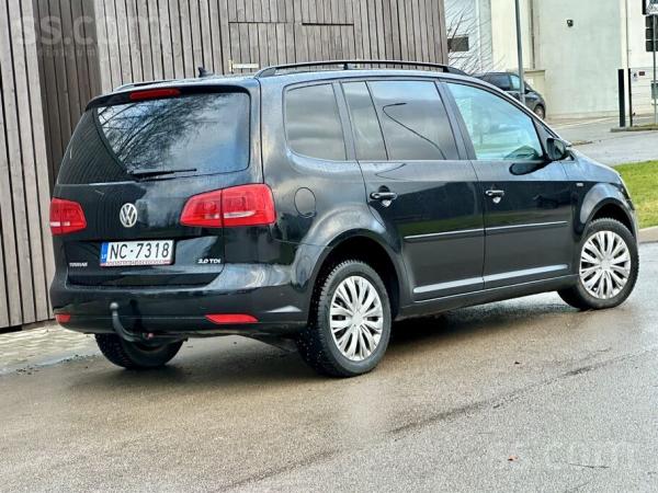 Black Volkswagen Touran 2012 in Jelgava, with an engine capacity of 2.00 L and mileage of 305 thousand km for 5700 €, photo 4 on AUTOMOTO.COM.LV