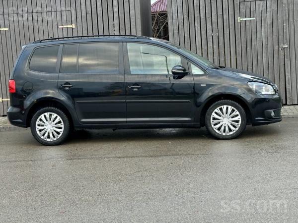 Black Volkswagen Touran 2012 in Jelgava, with an engine capacity of 2.00 L and mileage of 305 thousand km for 5700 €, photo 5 on AUTOMOTO.COM.LV