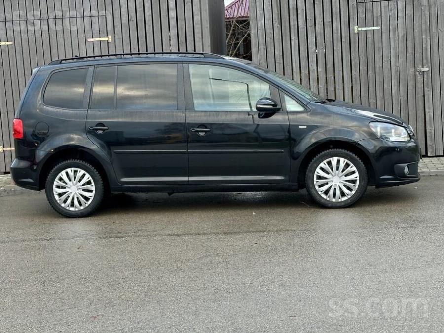 Black Volkswagen Touran 2012 in Jelgava, with an engine capacity of 2.00 L and mileage of 305 thousand km for 5700 €, photo 5 on AUTOMOTO.COM.LV