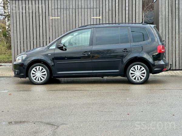 Black Volkswagen Touran 2012 in Jelgava, with an engine capacity of 2.00 L and mileage of 305 thousand km for 5700 €, photo 6 on AUTOMOTO.COM.LV