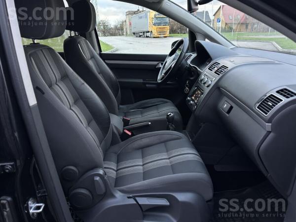 Black Volkswagen Touran 2012 in Jelgava, with an engine capacity of 2.00 L and mileage of 305 thousand km for 5700 €, photo 9 on AUTOMOTO.COM.LV