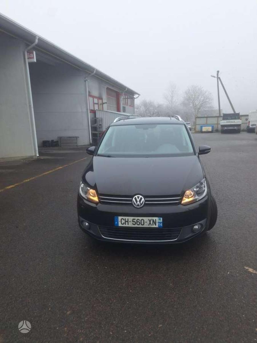 Black Volkswagen Touran 2012 in Vilnius, with an engine capacity of 1.97 L and mileage of 244 thousand km for 6650 €, photo 2 on AUTOMOTO.COM.LV