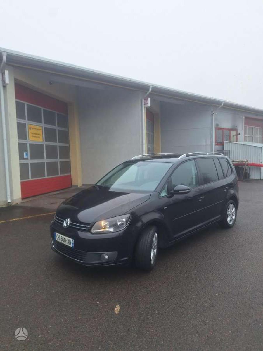 Black Volkswagen Touran 2012 in Vilnius, with an engine capacity of 1.97 L and mileage of 244 thousand km for 6650 €, photo 3 on AUTOMOTO.COM.LV