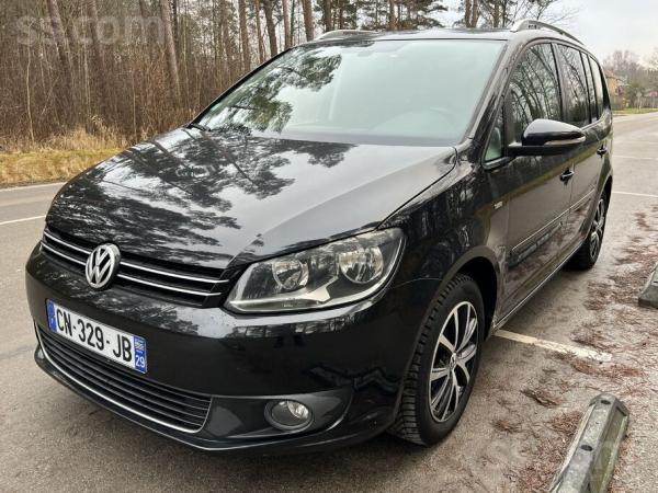 Melns Volkswagen Touran 2012 Rīga, ar dzinēja tilpumu 1.60 L un nobraukumu 0 tūkst. km par 5850 €, foto 1 vietnē AUTOMOTO.COM.LV
