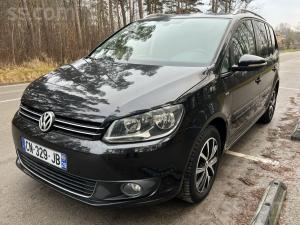 Melns Volkswagen Touran 2012 Rīga, ar dzinēja tilpumu 1.60 L un nobraukumu 0 tūkst. km par 5850 €, foto  vietnē AUTOMOTO.COM.LV