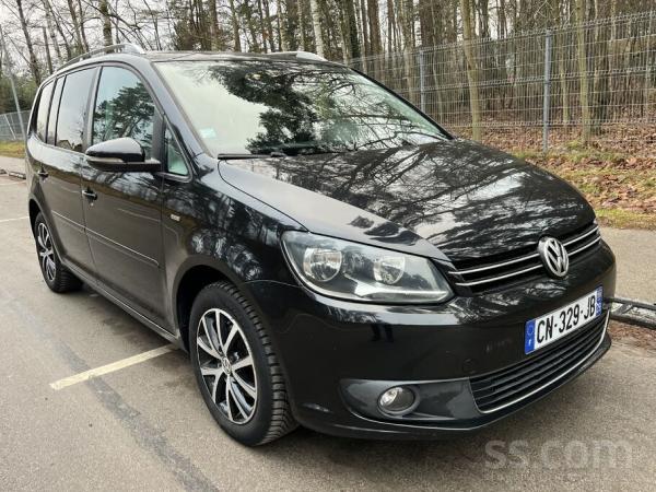 Melns Volkswagen Touran 2012 Rīga, ar dzinēja tilpumu 1.60 L un nobraukumu 0 tūkst. km par 5850 €, foto 2 vietnē AUTOMOTO.COM.LV