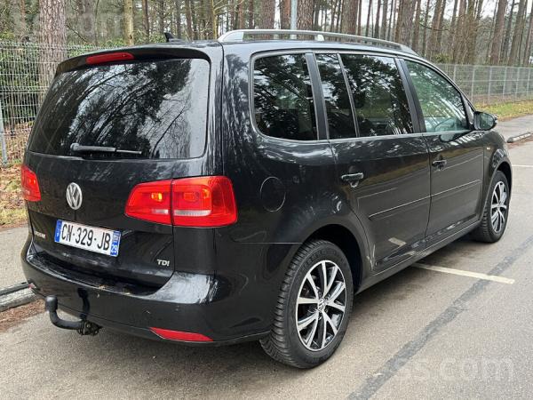 Melns Volkswagen Touran 2012 Rīga, ar dzinēja tilpumu 1.60 L un nobraukumu 0 tūkst. km par 5850 €, foto 4 vietnē AUTOMOTO.COM.LV