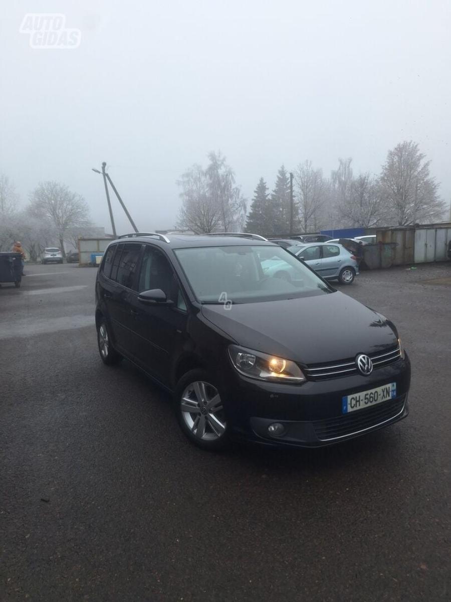 Black Volkswagen Touran 2012 in Vilnius, with an engine capacity of 2.00 L and mileage of 244 thousand km for 6650 €, photo 1 on AUTOMOTO.COM.LV
