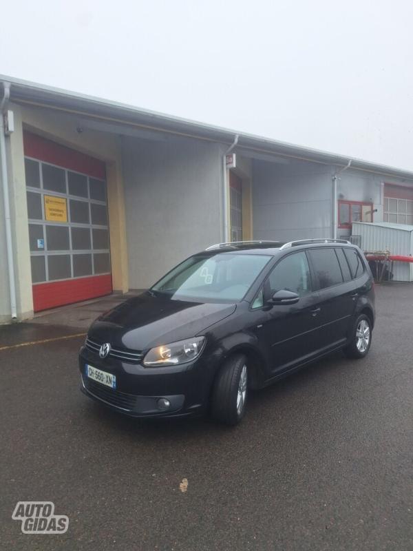 Black Volkswagen Touran 2012 in Vilnius, with an engine capacity of 2.00 L and mileage of 244 thousand km for 6650 €, photo 2 on AUTOMOTO.COM.LV