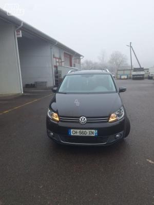 Black Volkswagen Touran 2012 in Vilnius, with an engine capacity of 2.00 L and mileage of 244 thousand km for 6650 €, photo 3 on AUTOMOTO.COM.LV